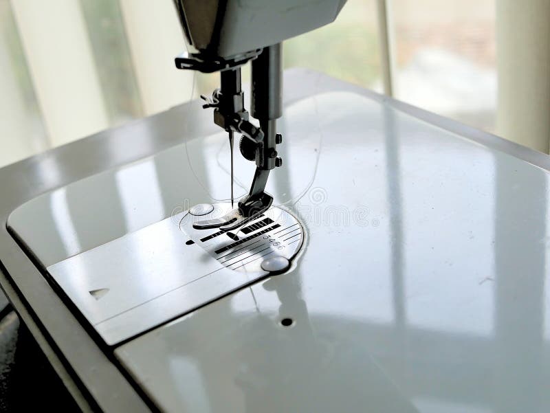 Sewing Machine Needle and White Thread in Sunlight Stock Photo - Image ...