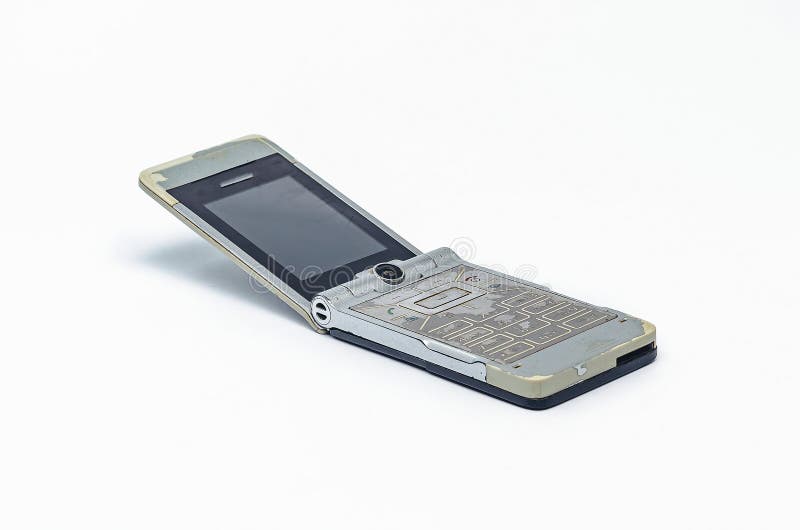 Retro Silver Flip Phone with Scratched Screen on White Backdrop Stock ...