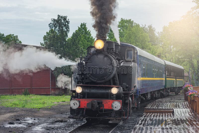Retro Steam Train Approaches To the Platform Stock Photo - Image of ...