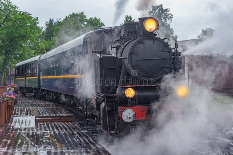 Retro Steam Train Approaches To the Platform Stock Photo - Image of ...