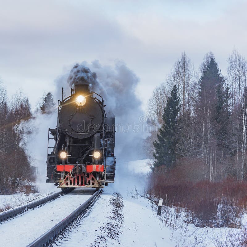 Retro Steam Train Arrives at Winter Stock Photo - Image of railroad ...