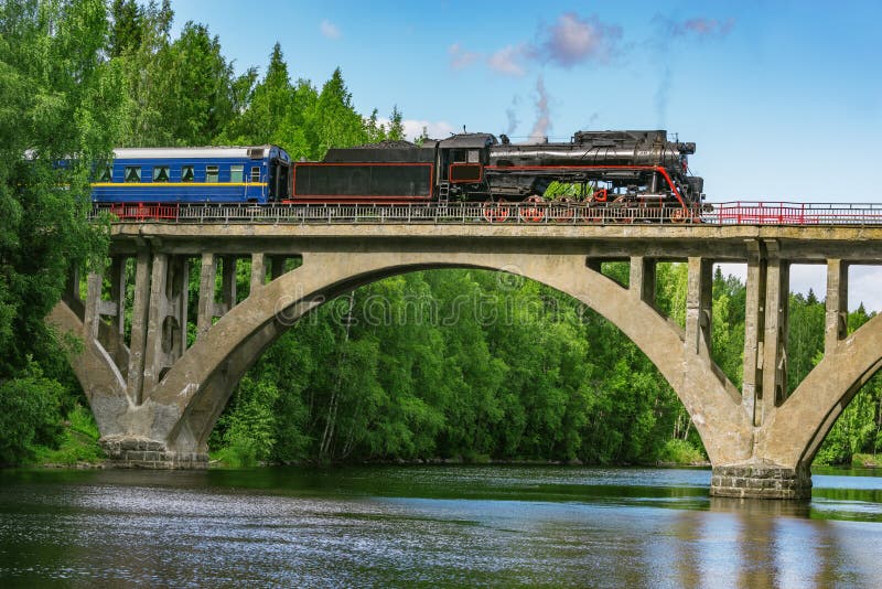 Retro steam train moves stock photo. Image of attraction - 253582710