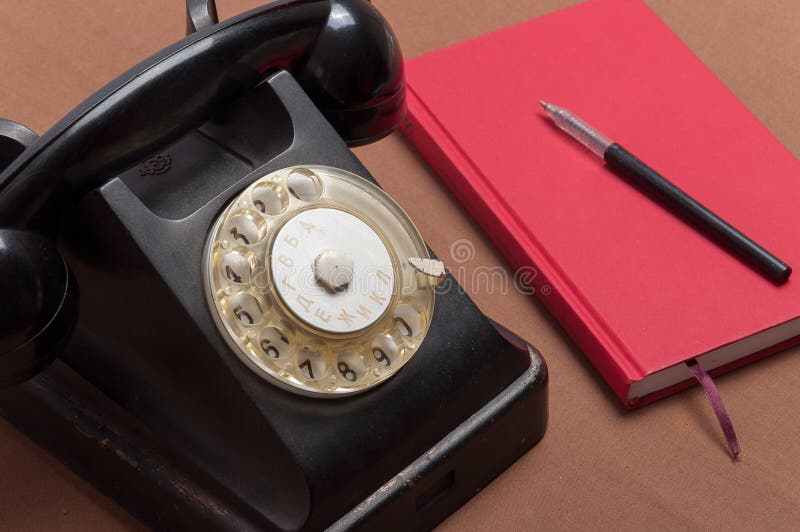 Retro Style Black Russian Dial Telephone and Notebook Stock Image ...