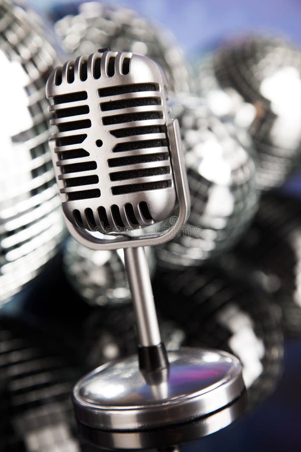 Retro Style Microphone on Sound Waves and Disco Balls Stock Photo ...