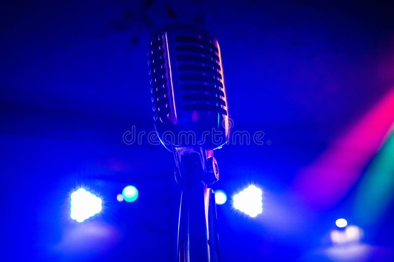 Retro Style Microphone on Stage Lights Background Stock Image - Image ...