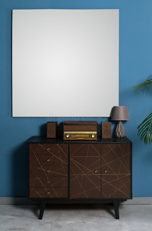 Retro Style Radio on Drawers Cabinet and Empty White Frame Stock Image ...