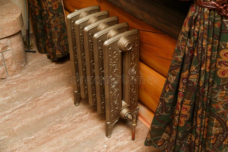 Retro Styled Cast Iron Radiator with Valve and Copper Pipe Stock Image ...