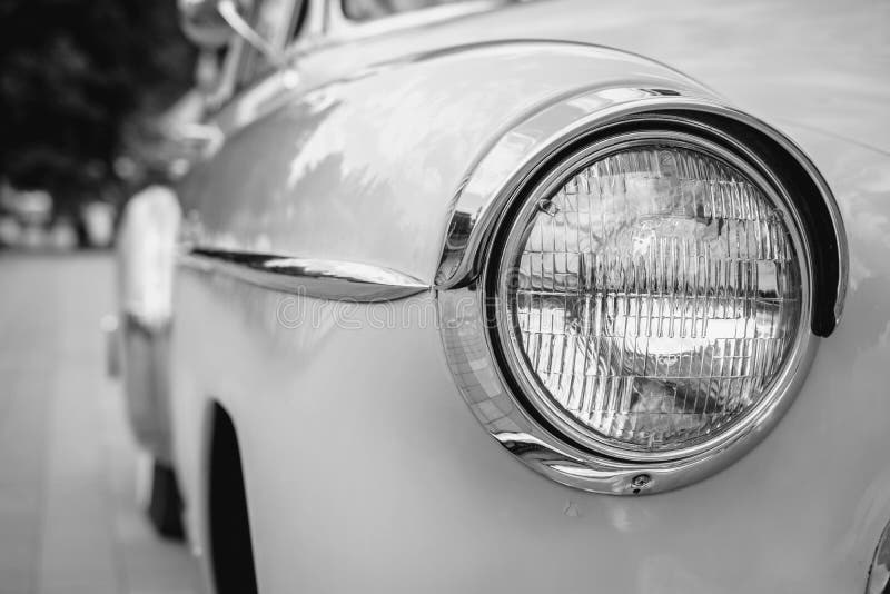 Retro-styled Front of a Classic Car with Round Headlights in Black and ...