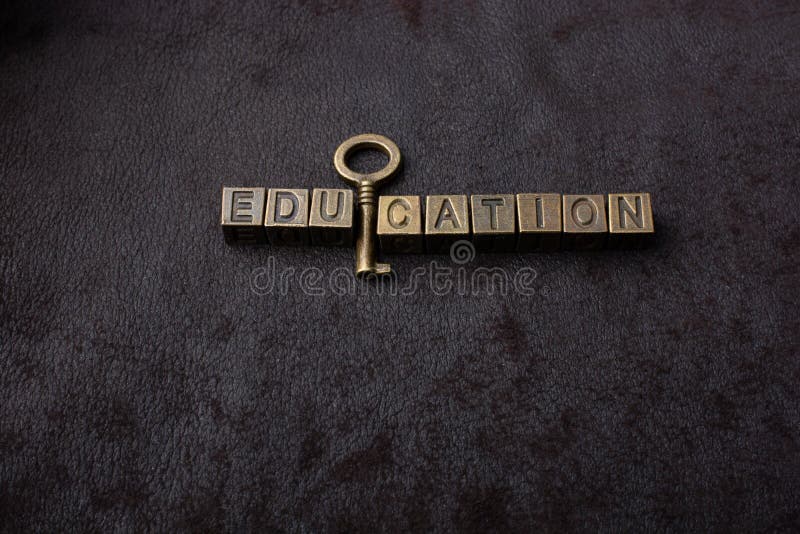 Retro Styled Metallic Decorative Key and Education Wording Stock Photo ...