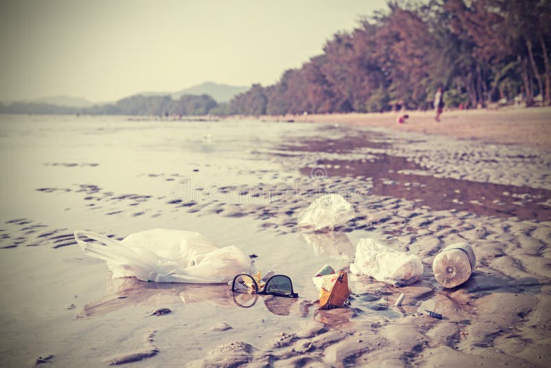 Retro Stylized Picture of Garbage on a Beach. Stock Photo - Image of ...
