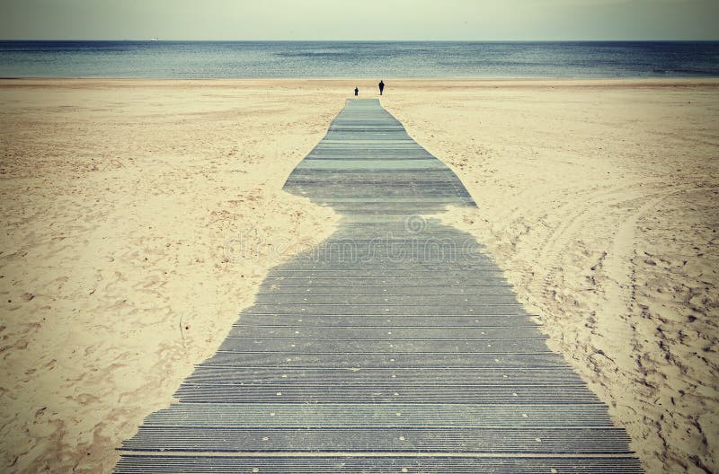 Retro Toned Photo of a Boardwalk on Beach Stock Image - Image of shore ...