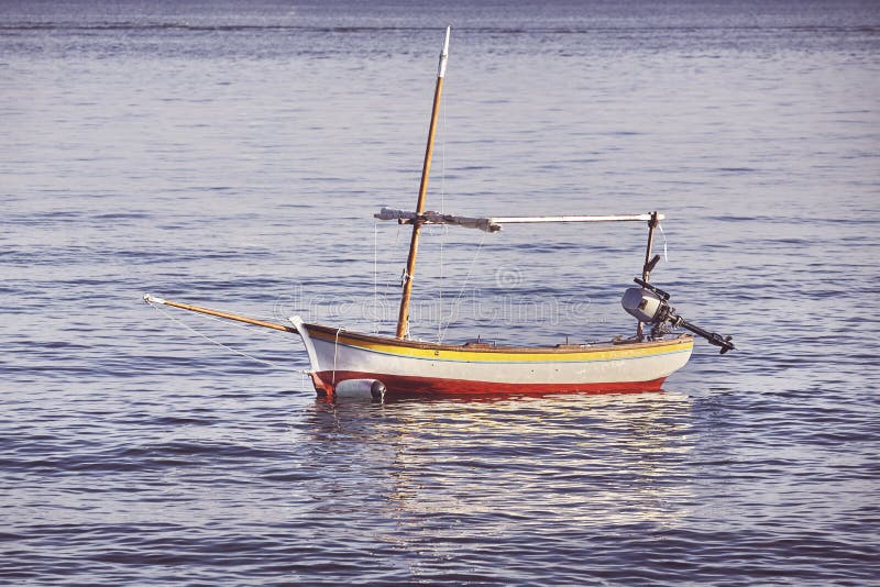 Retro Toned Picture of an Old Boat at Sea Stock Photo - Image of boat ...