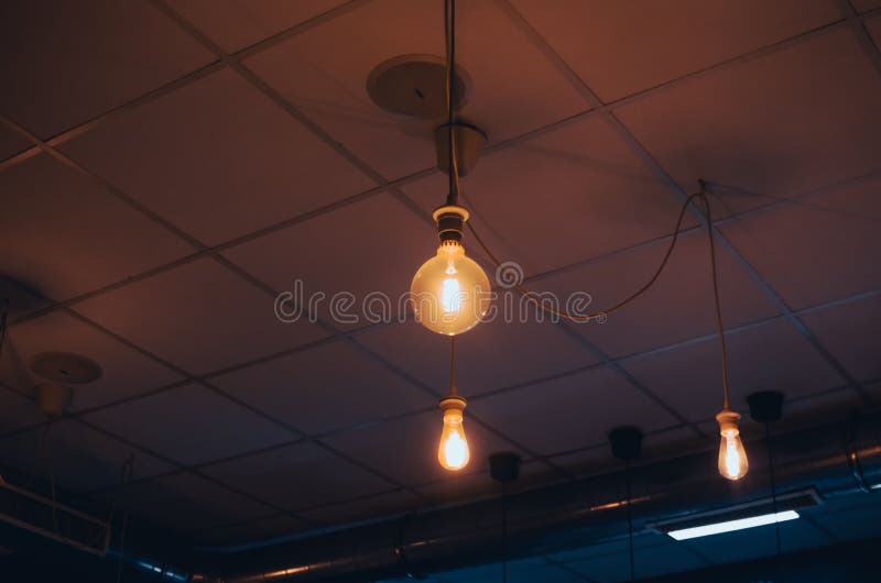Retro Tungsten Light Bulb in a Coffee Shop Stock Image - Image of ...