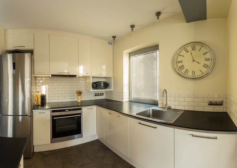 Retro Wall Clock in Kitchen Stock Photo - Image of kitchen, clock: 58084978