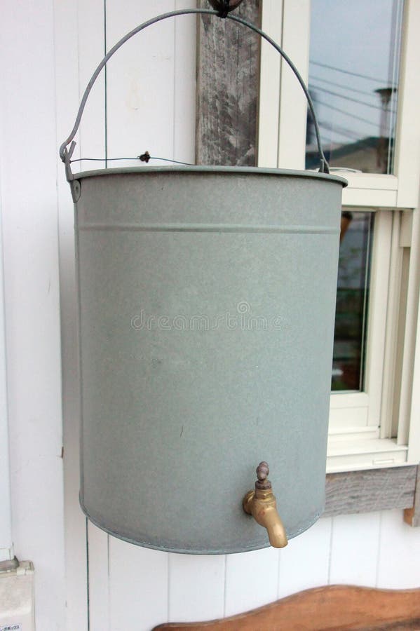 Retro water bucket stock photo. Image of cans, plate - 68675770