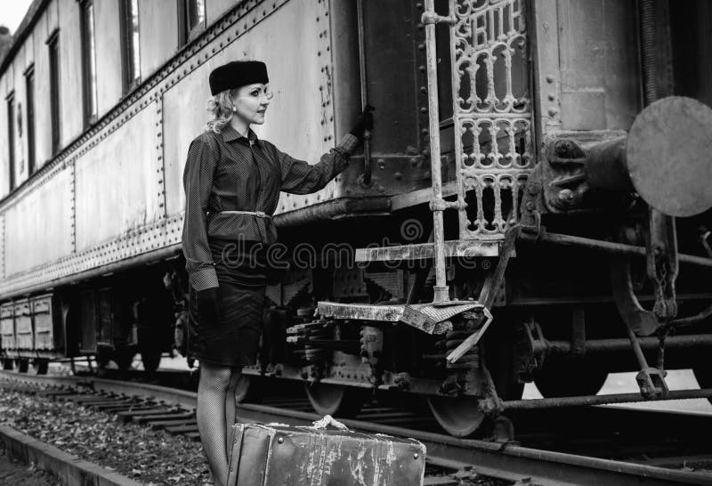 Woman on the train station stock image. Image of luggage - 205772429