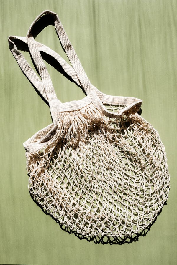 Reusable Cotton Shopping String Bag on Green and Beige Background. Zero ...