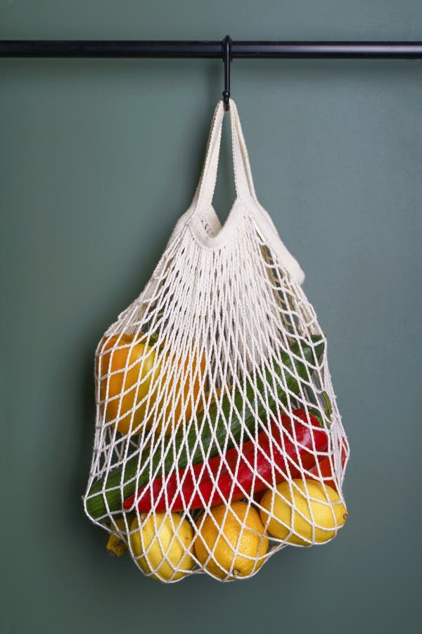 A Reusable Shopping String Bag with Vegetables and Fruit from the ...