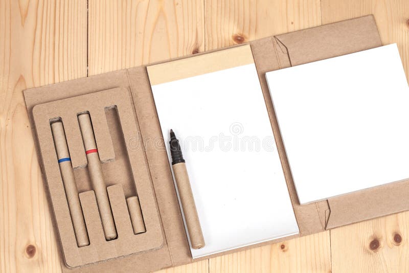 Reuse Note Book with Pen on a Wooden Stock Photo - Image of notebook ...