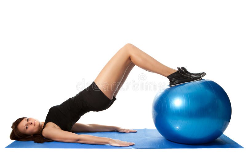 Reverse leg roll excercise stock image. Image of ball - 16783919