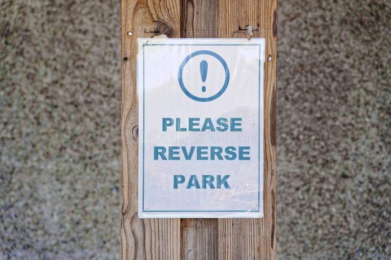Reverse Park Please Sign at Public Car Park Stock Photo - Image of ...