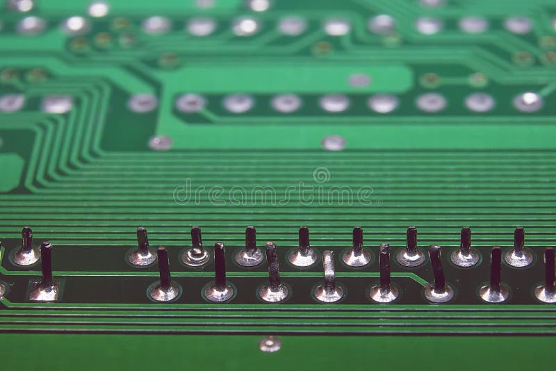 The Flip Side of the Green Electronic Board with Soldered Chips and ...