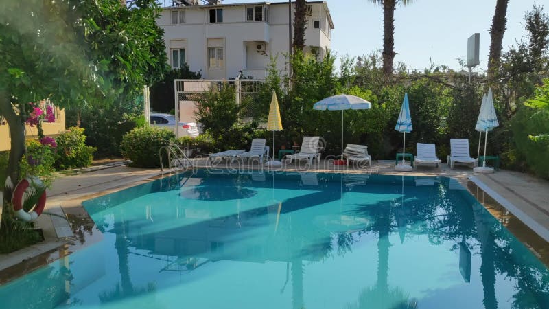 Review of a Cozy Courtyard with a Swimming Pool Stock Video - Video of ...