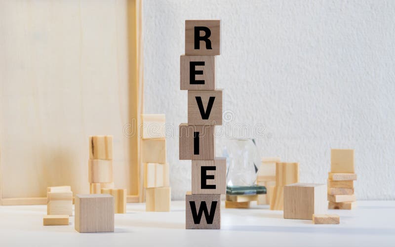 Review Headline Sign Made of Wood on a Table Stock Image - Image of ...