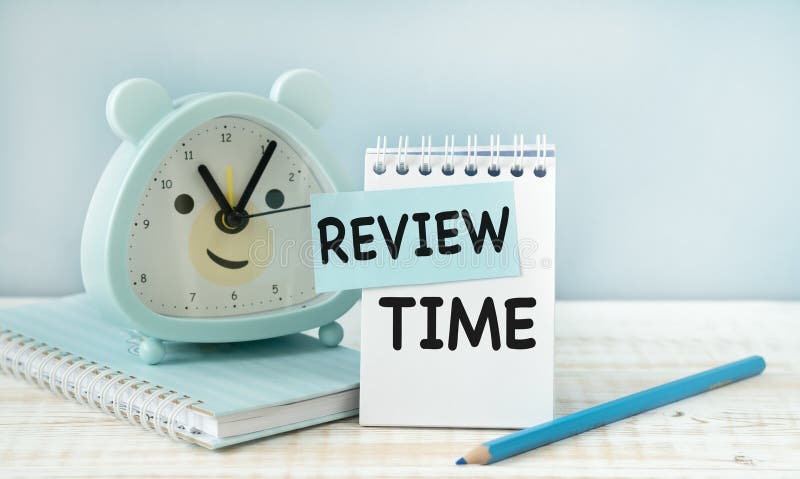 Review Time Word on Notebook with Clock and Blue Pencil . Review and ...