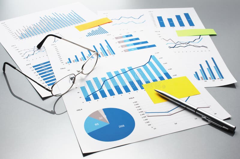 Reviewing Financial Reports. Graphs and Charts. Stock Photo - Image of ...