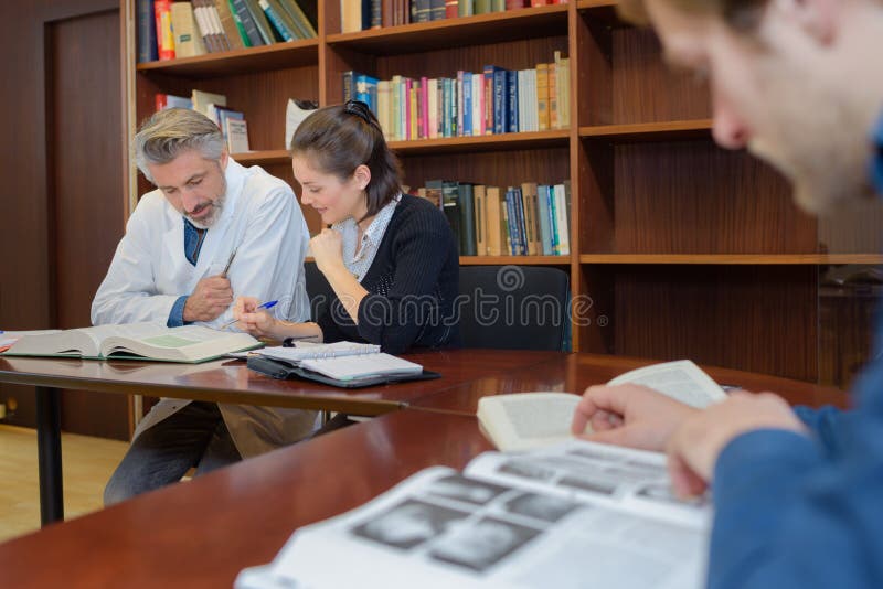 Reviewing for the exam stock image. Image of reviewing - 132200011