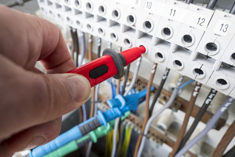 Revision Electric stock image. Image of electronic, hand - 140215331