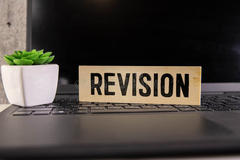 Revision Word Made from Metallic Letterpress on Dark Jeans Background ...