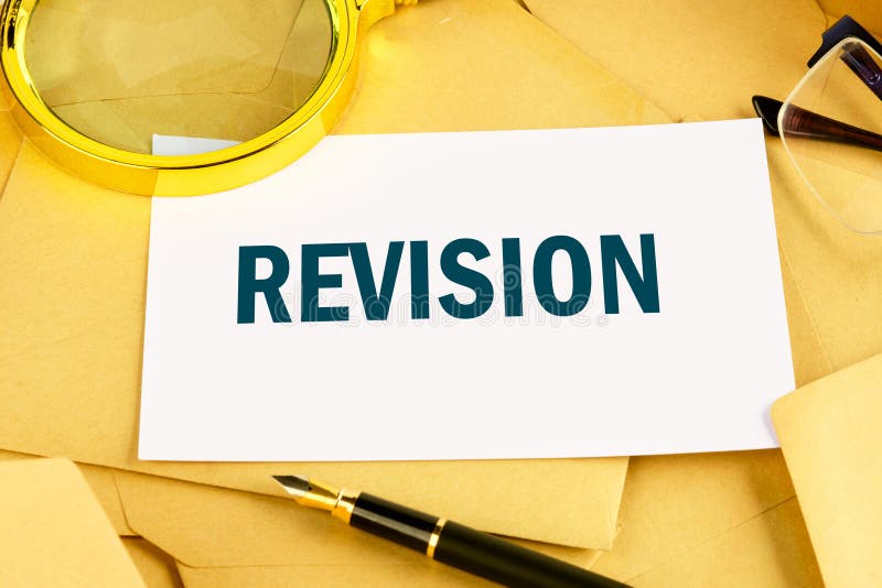 REVISION Written on the Card Against the Background of Scattered ...