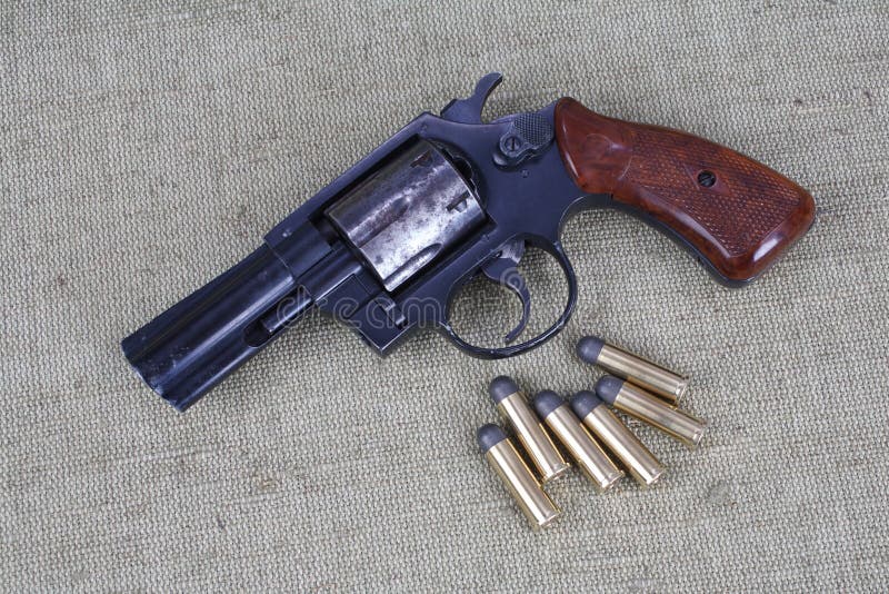 Revolver with ammunition stock image. Image of magnum - 122448153