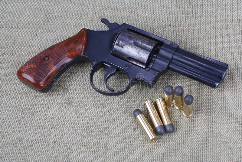 Revolver with ammunition stock photo. Image of revolver - 122448184
