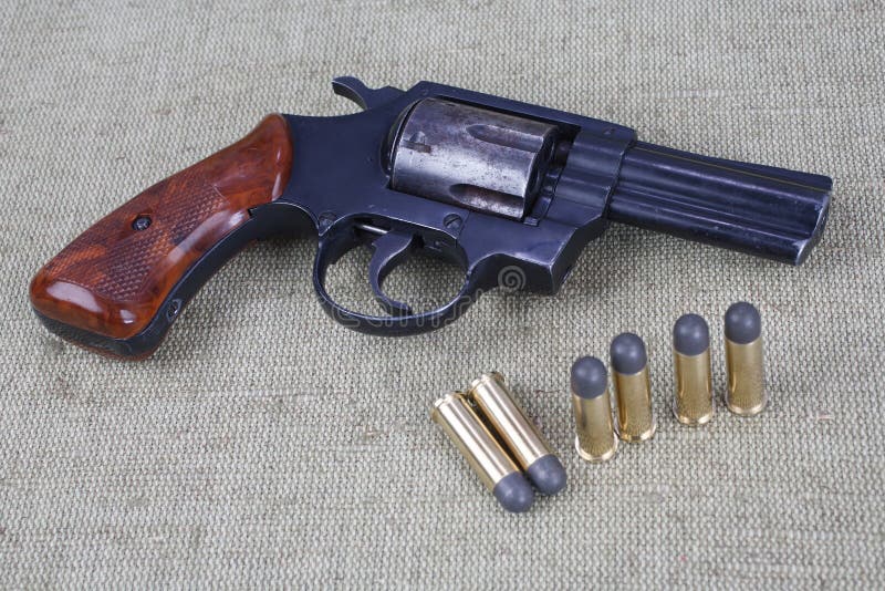 Revolver with ammunition stock image. Image of barrel - 135754197