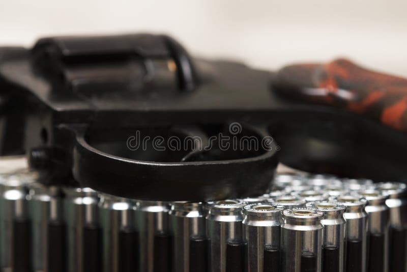 Revolver and ammunition stock photo. Image of background - 83708642
