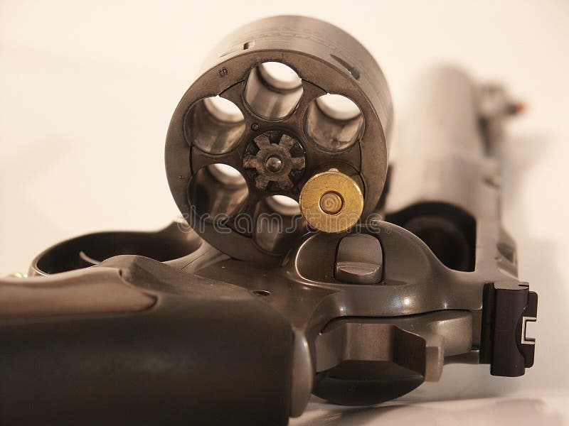 Revolver with bullet stock photo. Image of large, police - 206600