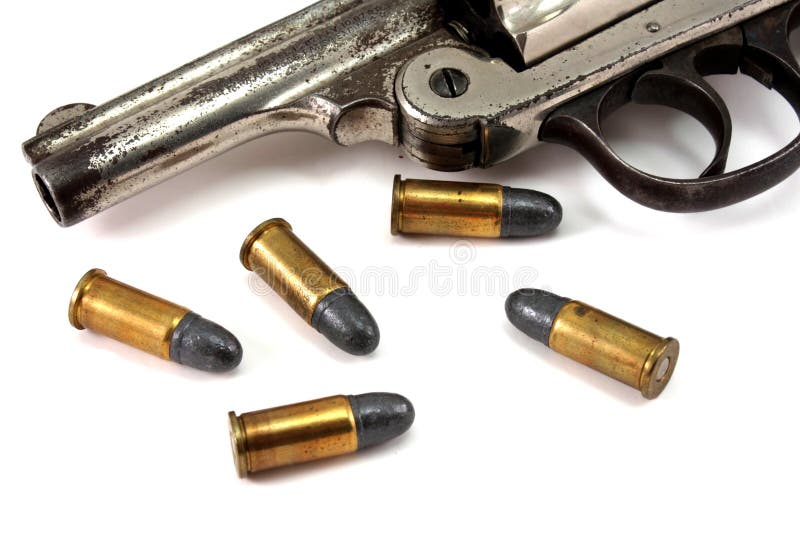 Revolver and Bullets stock photo. Image of machinegun - 8144506