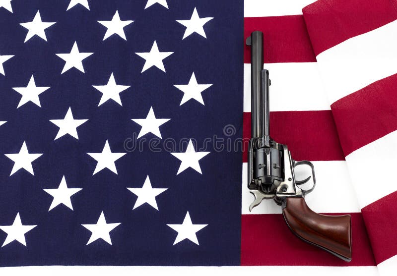 Revolver Laying on an American Flag Stock Image - Image of weapon ...
