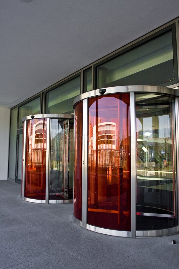 Red revolving doors stock image. Image of door, modern, steel - 95195