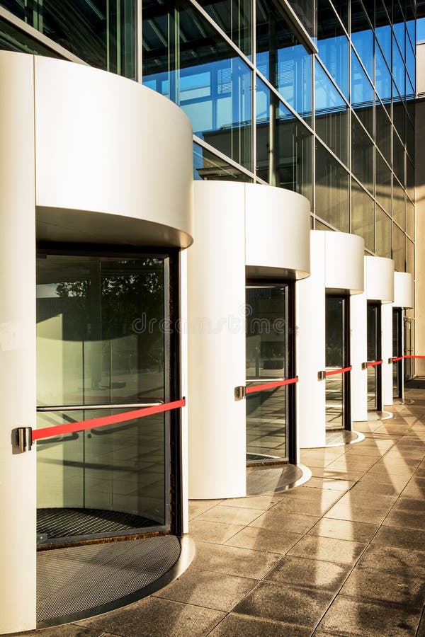 Revolving doors stock image. Image of spinning, revolving - 65765717