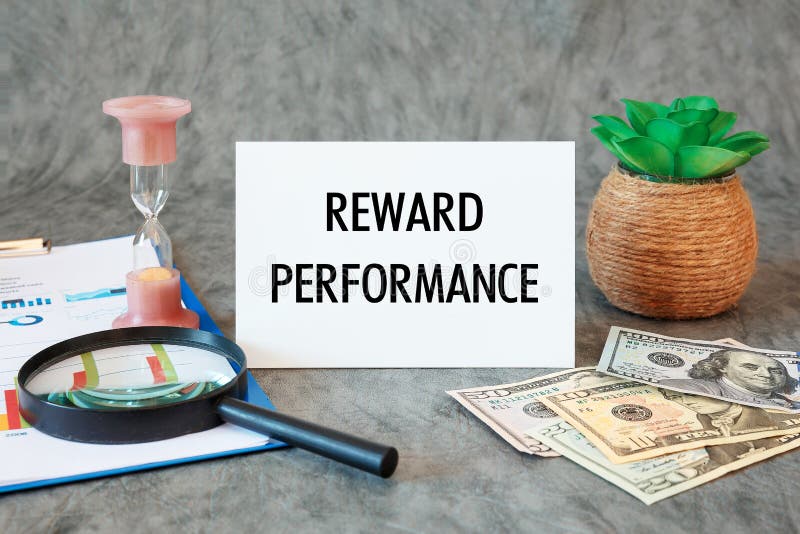 REWARD PERFORMANCE is Written in a Document on the Office Desk, Money ...