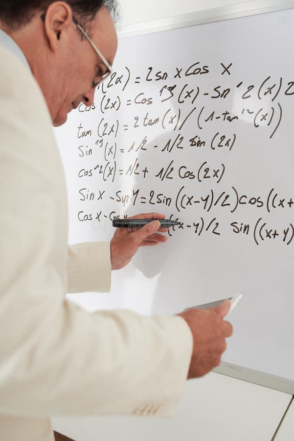 Rewriting math formulas stock photo. Image of whiteboard - 61731658