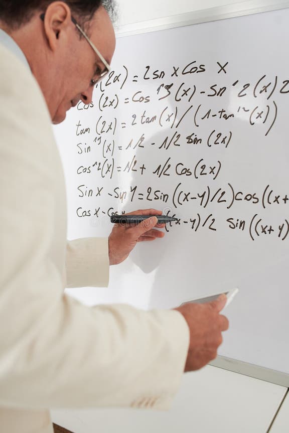 Rewriting math formulas stock photo. Image of whiteboard - 61731658