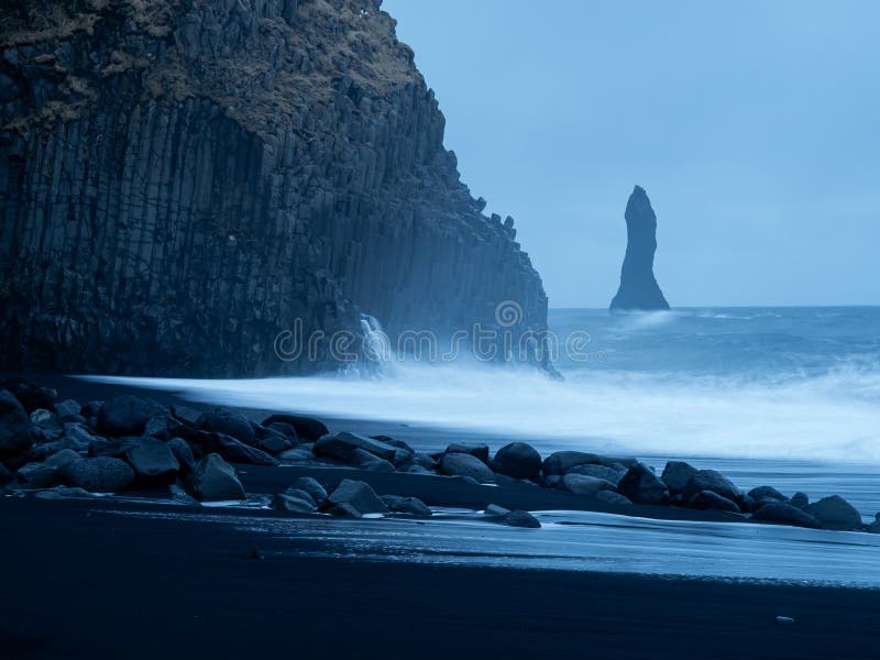 Reynisfjara Beach at Twilight, Featuring the Iconic Reynisdrangar Sea ...