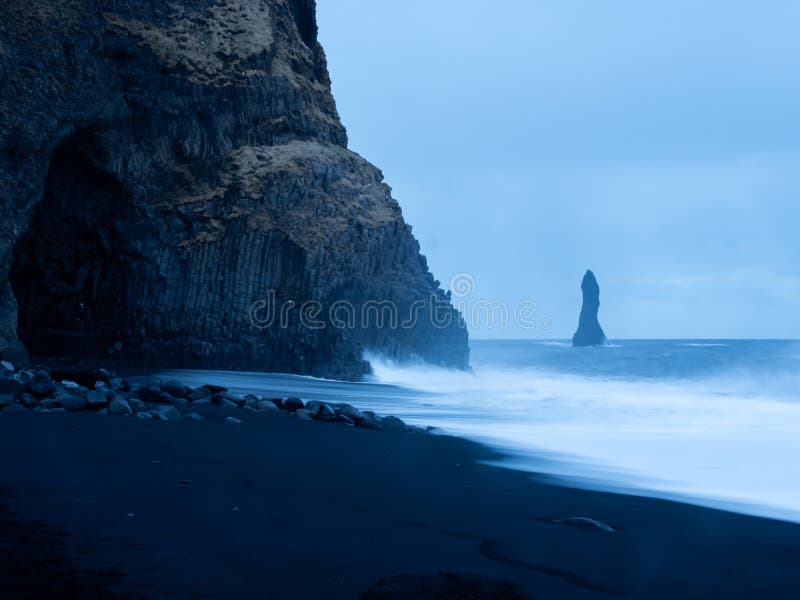 Reynisfjara Beach at Twilight, Featuring the Iconic Reynisdrangar Sea ...