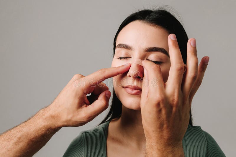 Rhinoplasty. Plastic Surgeon is Taping Nose To Patient during ...