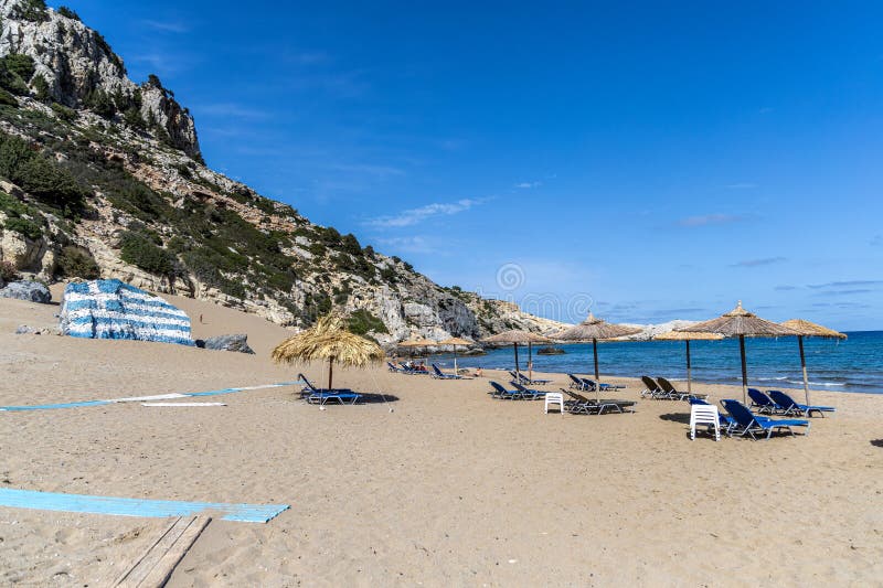 Rhodes, Greece - May 9, 2024: Tsambika Beach Landscape with Greece Flag ...